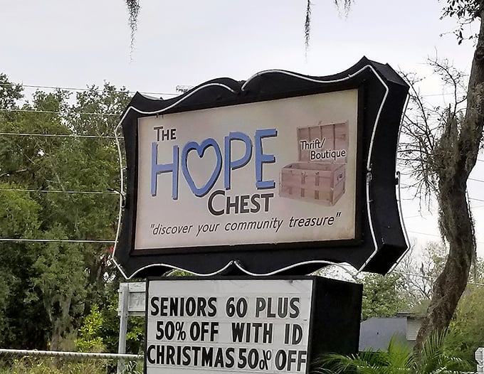 The sign says it all: "discover your community treasure." Seniors get 50% off, proving wisdom really does come with age—and discounts!