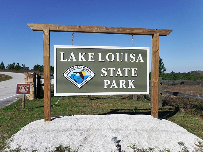 The gateway to 4,500 acres of natural Florida. Once you pass this sign, Mickey Mouse feels a world away.