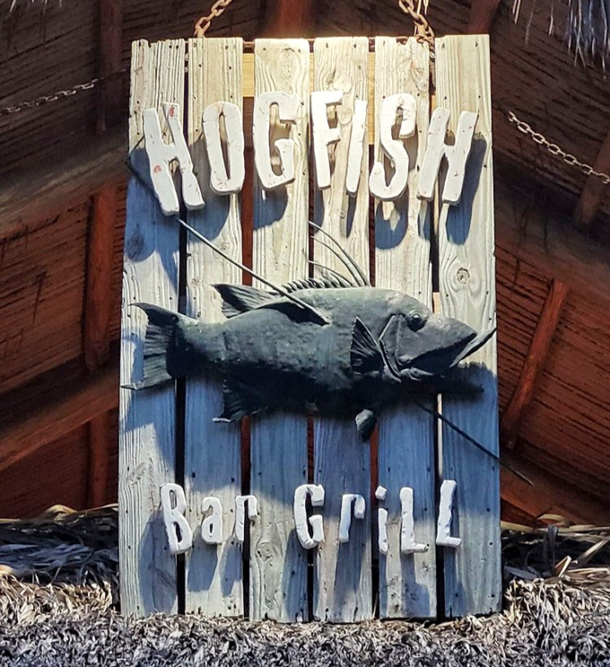 The sign says it all—you've arrived at hogfish heaven, where the namesake fish isn't just on the menu, it's practically the mayor.