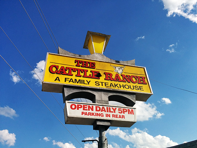 That yellow sign against the Florida blue sky isn't just a marker—it's a beacon of hope for the hungry and a landmark for locals in the know.