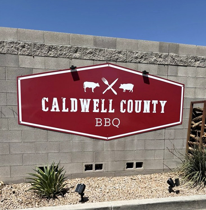 The red and white logo announces your arrival at barbecue paradise—a beacon of hope for hungry travelers seeking smoky salvation.