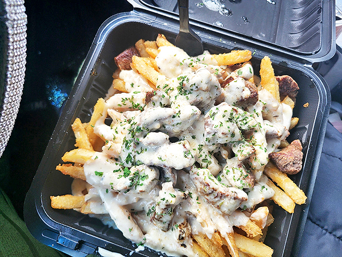 Loaded fries that make sharing feel like a moral dilemma. "I'll just have one more" becomes the lie you tell yourself repeatedly.