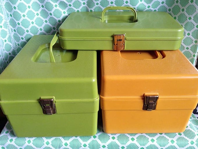Storage boxes in avocado and harvest gold—the colors that dominated America's homes before stainless steel took over. Practical nostalgia at its finest.