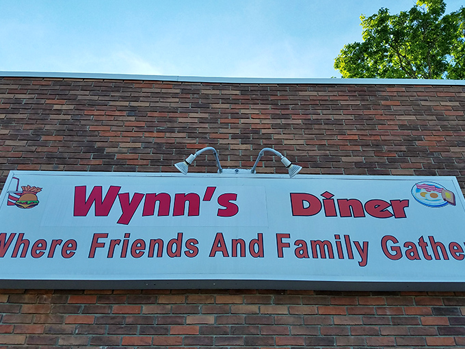 "Where Friends And Family Gather" isn't just a tagline—it's a mission statement. This sign has guided hungry travelers to breakfast bliss for years.