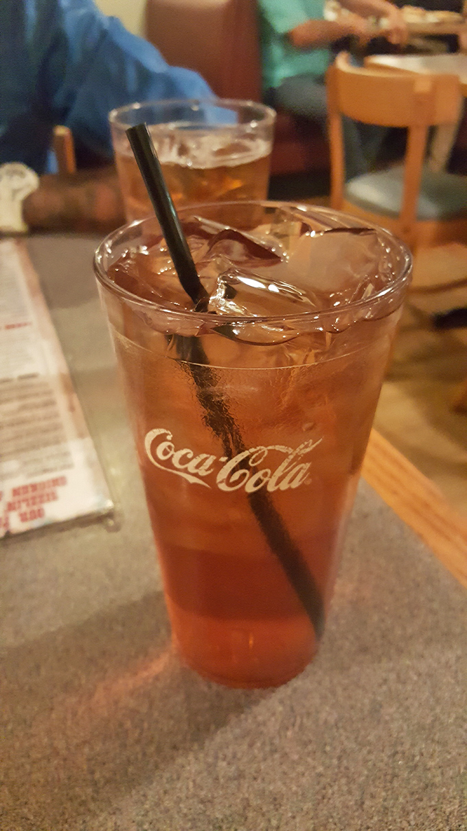 Sweet tea in a classic Coca-Cola glass—the unofficial champagne of the South and the perfect companion to seafood that demands to be savored.
