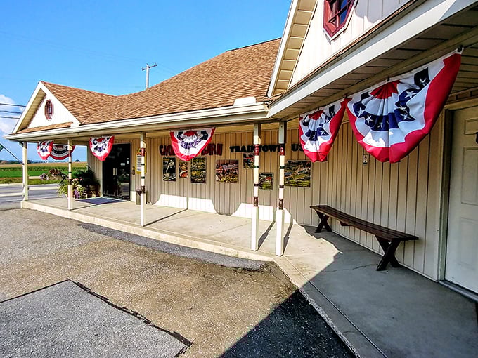The Shops of Traintown greet visitors with patriotic bunting and a bench that practically begs you to sit awhile and watch the world roll by at a deliciously unhurried pace.