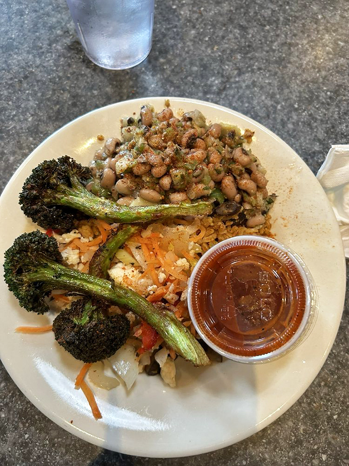 A veggie bowl that doesn't feel like punishment. Roasted broccoli, beans, and grains prove Big's isn't just about chicken—though that's reason enough to visit.