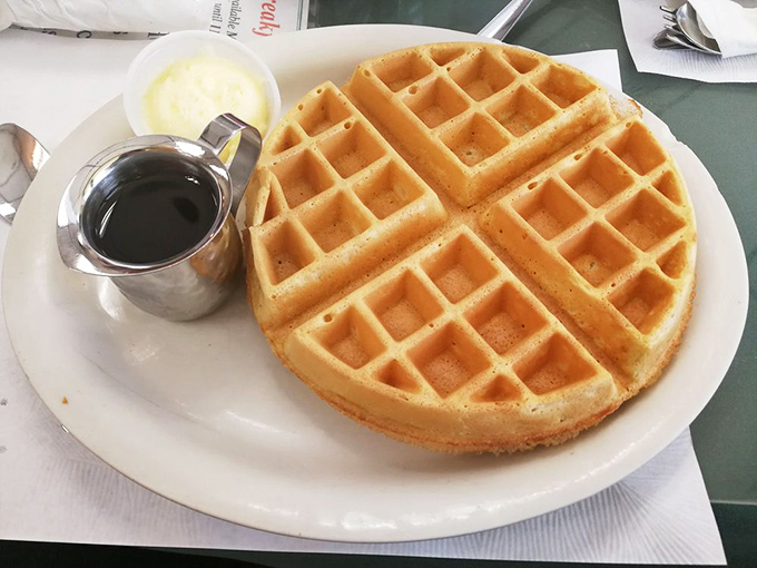The perfect waffle doesn't need to be fancy – just geometrically pleasing, golden-crisp, and ready for its maple syrup waterfall.
