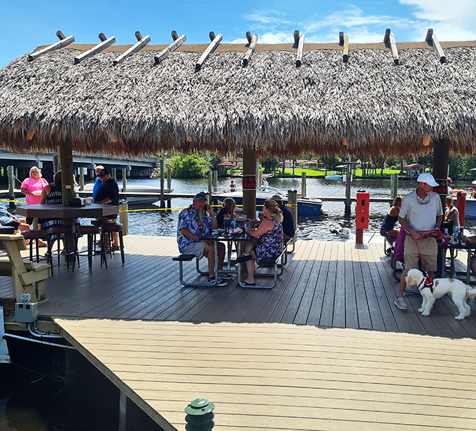 Waterfront dining under a thatched roof – where boats pull up for lunch and the view competes with the food for your attention.
