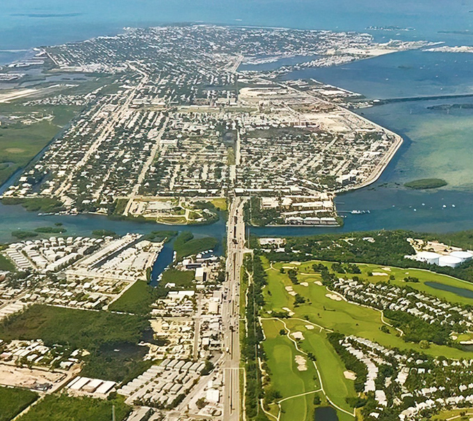 Key West from above resembles a beautiful jigsaw puzzle—one tiny island surrounded by every shade of blue ever invented.