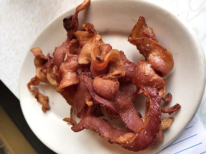 Bacon done right—crispy yet tender, the breakfast MVP that's been winning championships since before kale knew it was a vegetable.