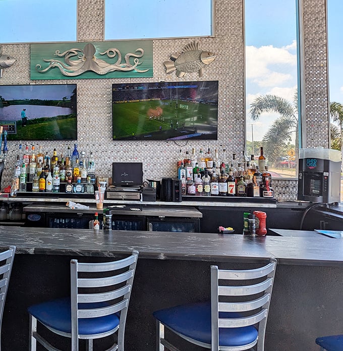 A bar adorned with oceanic artwork where libations flow like the tide. The perfect perch to watch sports while deciding which seafood treasure to hunt next.