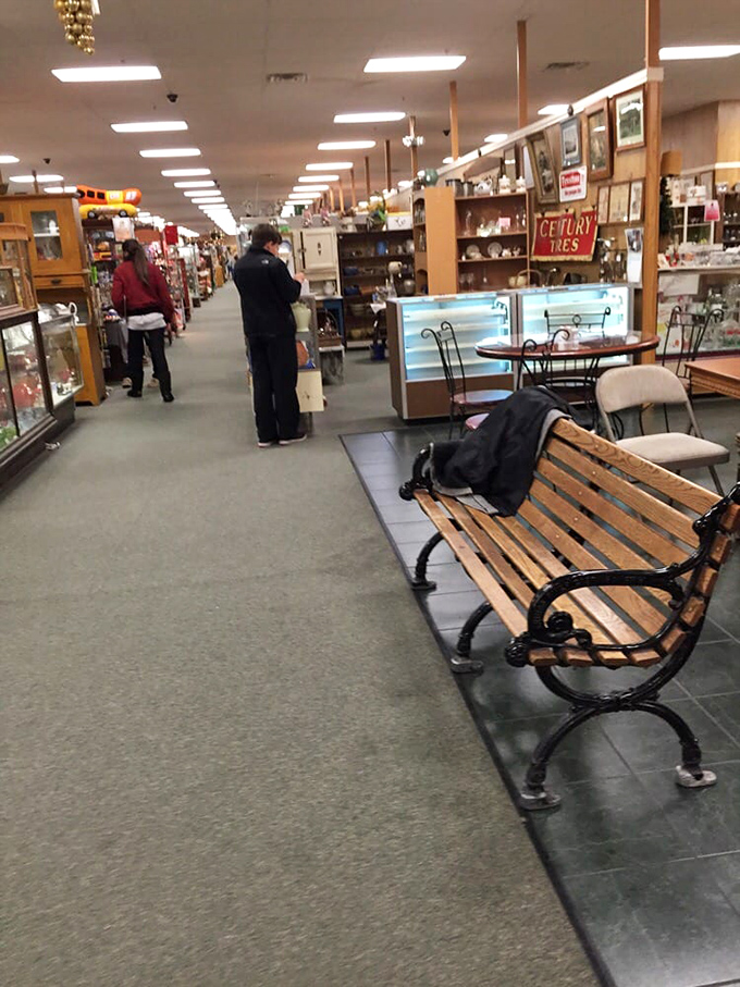 Strategic rest stops like this bench are the unsung heroes of serious antiquing—a place to contemplate purchases or rest weary treasure-hunting feet.