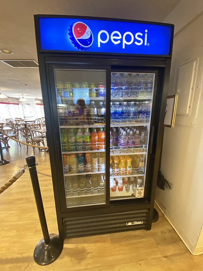 The beverage cooler of champions. Behind those glass doors lie the liquid companions to your meal—choose wisely, my friends.