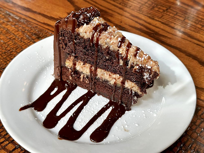 Layers of chocolate cake and cream topped with chocolate drizzle—a Black Forest-inspired creation that's worth every calorie and moment of gym guilt.