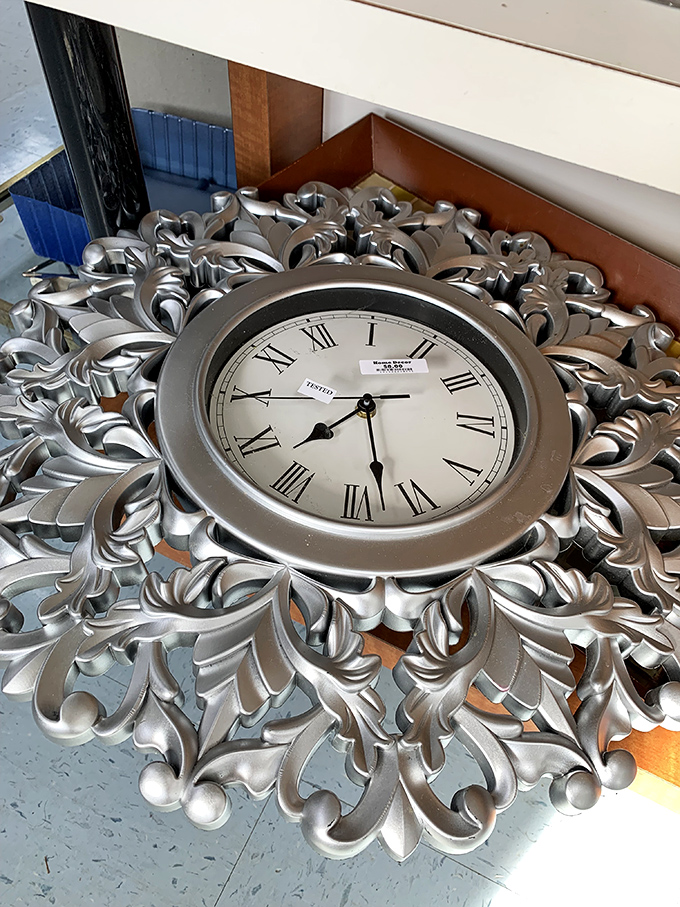 This ornate silver clock doesn't just tell time—it announces it with the dramatic flair of a Broadway diva taking center stage.