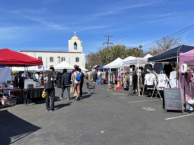 Weekend warriors of vintage shopping scan the racks while vendors stand ready—all participants in LA's favorite recurring treasure hunt.