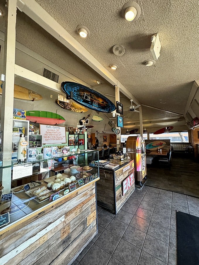 The counter view—where breakfast dreams come to life. Surfboards overhead remind you that calories don't count when you're on "vacation."