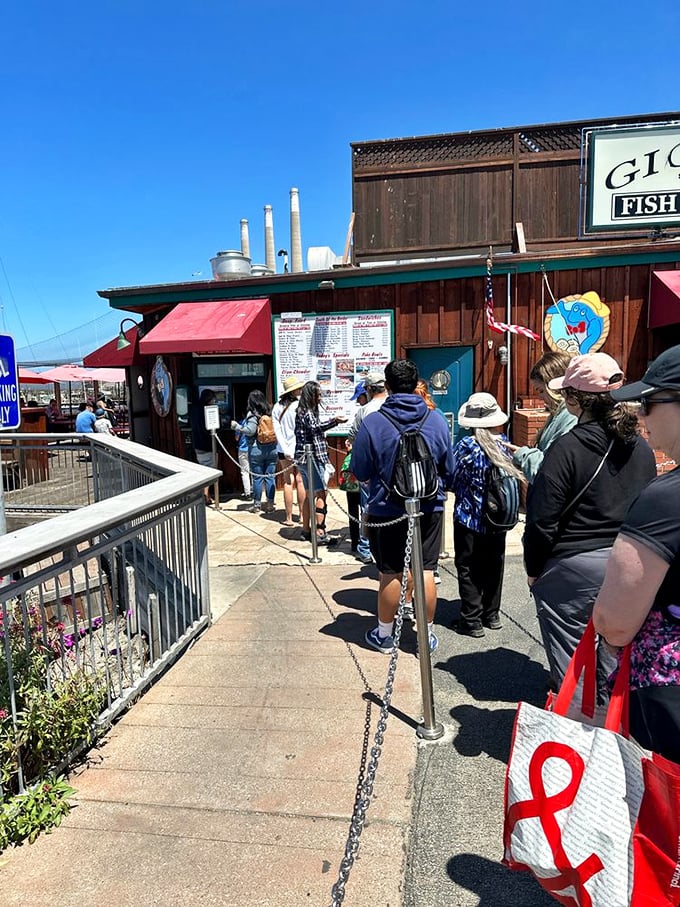 The line of eager customers isn't just a queue—it's a testament to seafood worth waiting for. Some pilgrimages involve mountains; this one involves chowder.