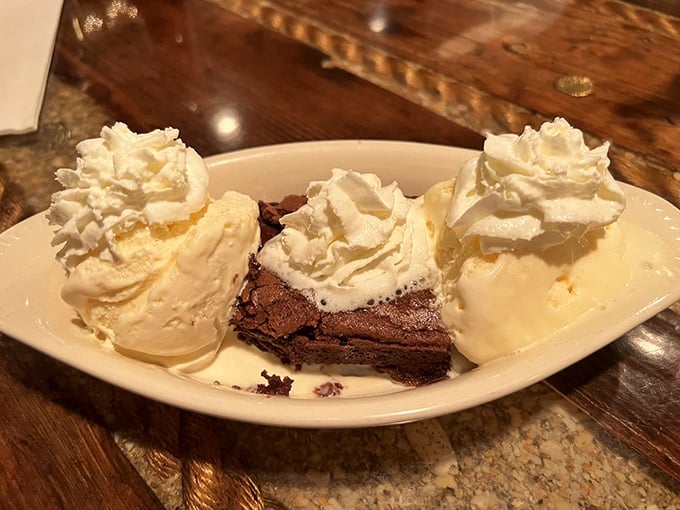 Brownie à la mode: where warm chocolate meets cold ice cream in a dessert romance for the ages. The whipped cream is just showing off at this point.