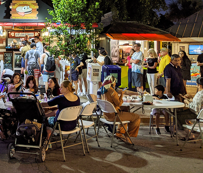 Night falls but the feast continues—locals and visitors alike drawn to this tiny shack like moths to a butter-drenched flame.