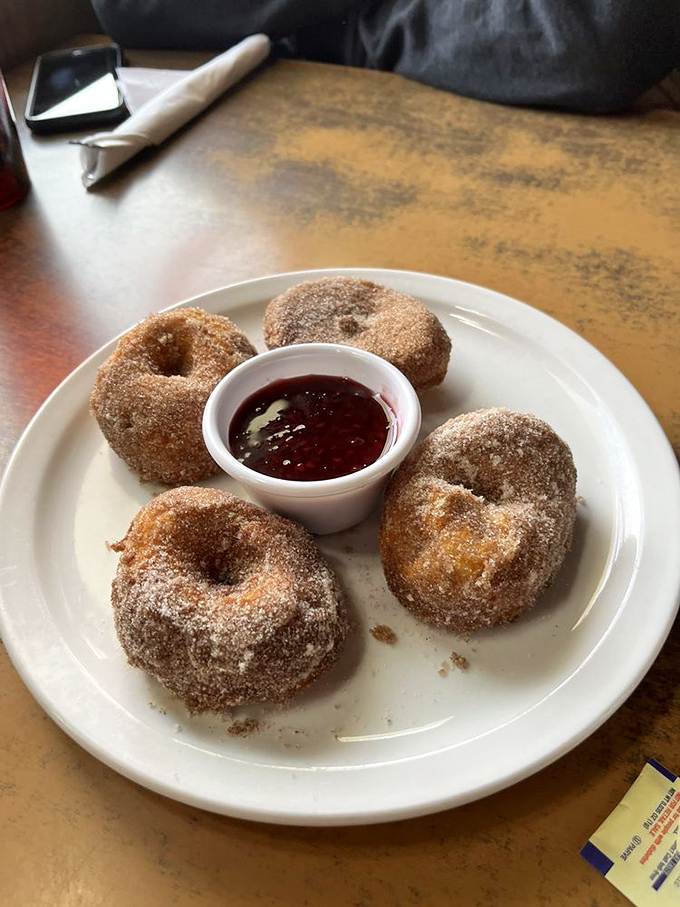 Five perfect spheres of fried dough bliss, served with jam for dipping – simple pleasures done absolutely right.