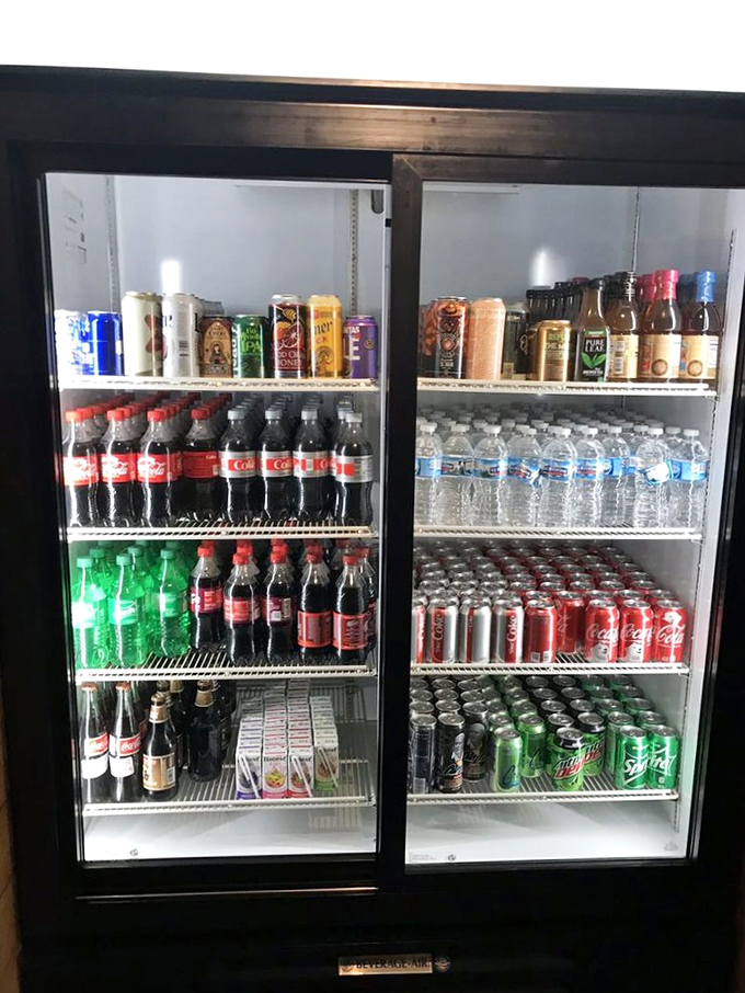 The beverage cooler – because even the most religious barbecue experience requires something to wash down all that smoky perfection.