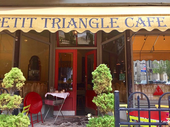 The welcoming entrance with its signature yellow awning and red doors promises an escape from Ohio to France—no passport required.