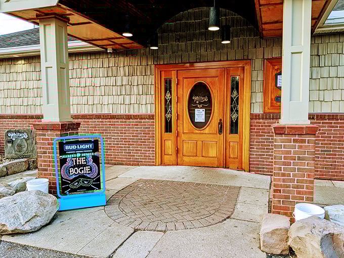 The wooden entrance with its stained glass insert doesn't just say "come in"—it promises you're about to join a treasured Ohio tradition.