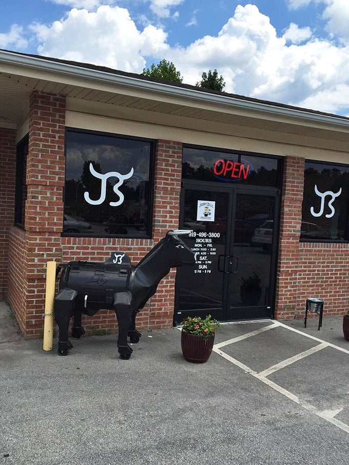The entrance says it all: unpretentious, welcoming, and guarded by a metal bull that's practically the restaurant's mascot.
