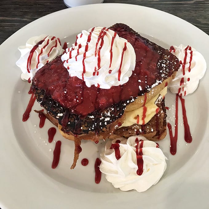 French toast wearing whipped cream like a fancy hat – because breakfast deserves to feel special too.