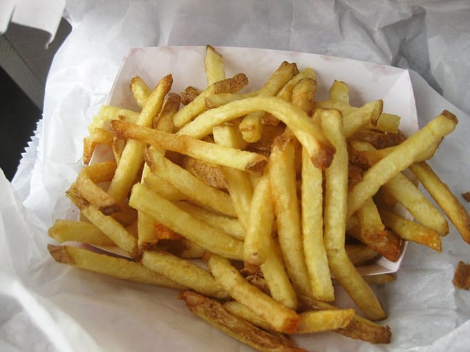 Golden, crispy, and perfectly salted – these aren't just french fries, they're the supporting actors that deserve their own standing ovation.