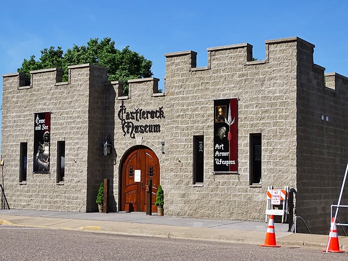 Sunlight bathes the castle exterior, its crenellated battlements standing proudly on Main Street like a medieval mirage in small-town Wisconsin.