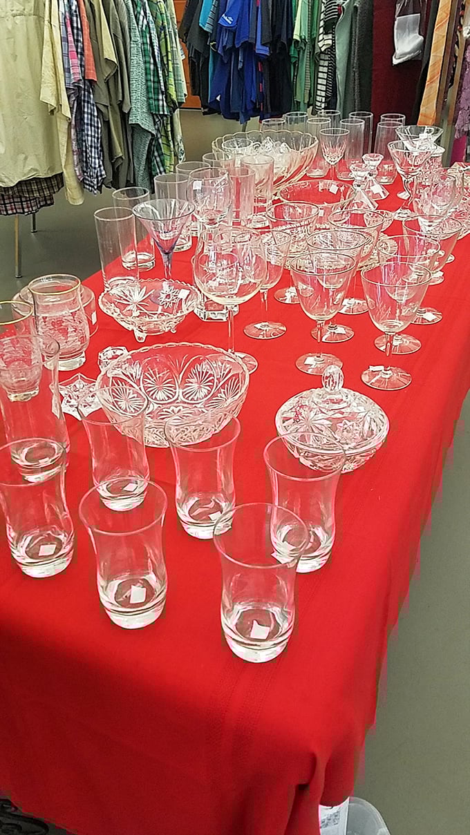 Crystal and glassware displayed like a fancy department store – perfect for those who want to host dinner parties with champagne taste on a beer budget.