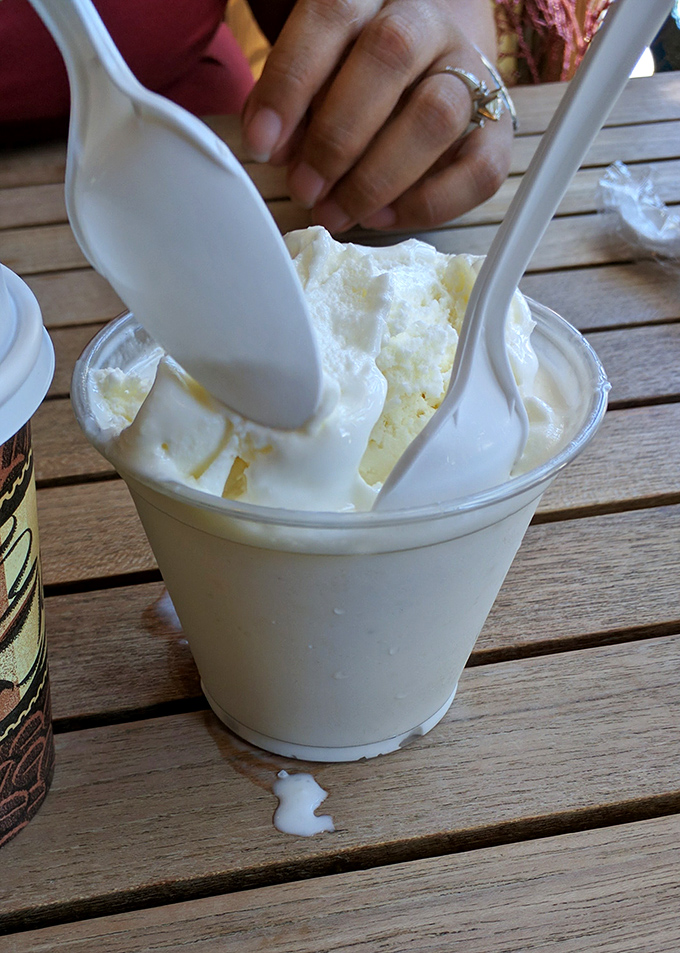 The key lime pie milkshake being enjoyed spoonful by spoonful – a frozen Florida moment that's worth every delicious calorie.