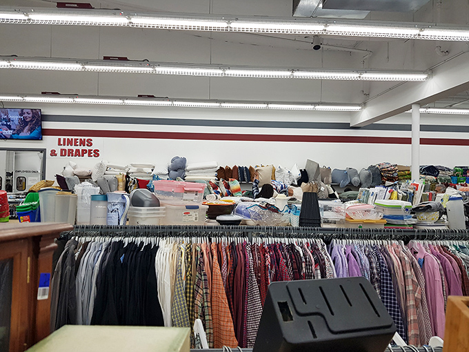 The "Linens & Drapes" section – where yesterday's window treatments and bedding await creative repurposing by thrifty home decorators.