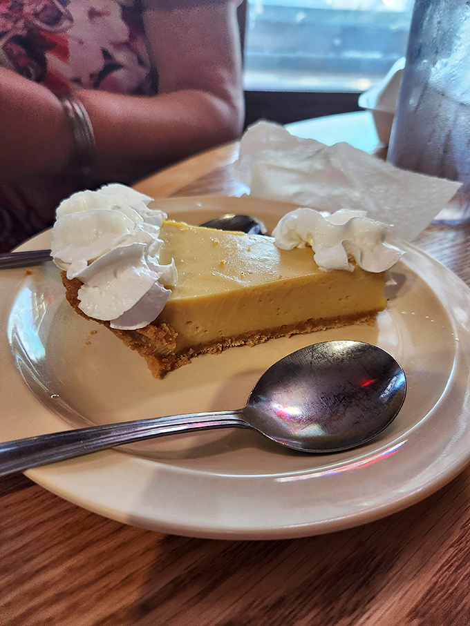 Key lime pie that strikes that perfect balance – tangy enough to make you pucker slightly, sweet enough to make you smile immediately after.