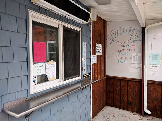 The order window—seafood's version of a confessional booth. "Forgive me, for I have not had crab in weeks" is a common opening line.