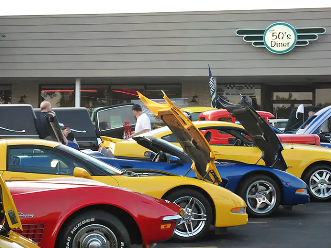 Car shows and chrome—where classic automobile enthusiasts gather to admire wheels before rolling inside for waffles.