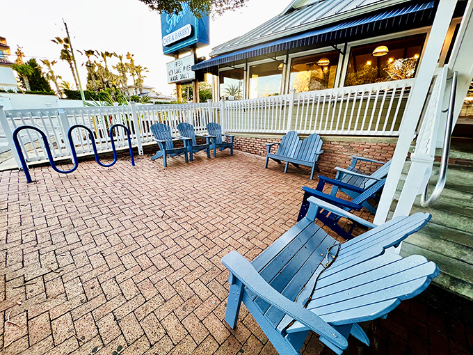 Blue Adirondack chairs waiting patiently for you to bring out that slice of pie. They've seen things – mostly happy people eating donuts.