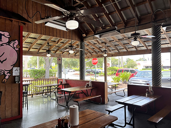 The covered patio offers a breezy spot to enjoy your barbecue bounty while watching the world go by – paper towel roll included, because they know what's coming.