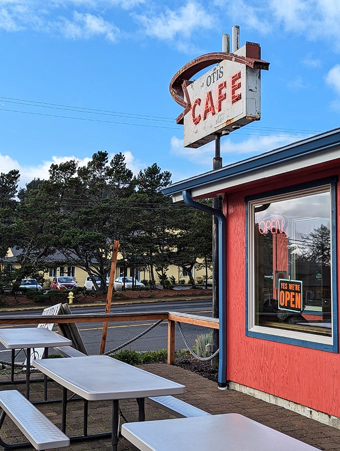 Picnic tables outside for those rare perfect Oregon days when blue skies complement the red building and homemade bread.