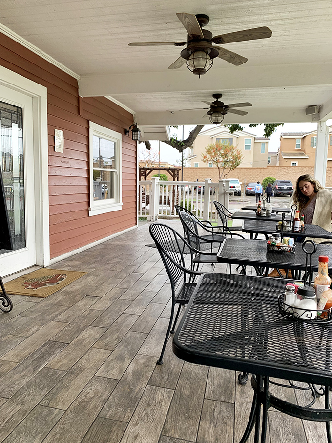 The covered patio offers the best of both worlds – fresh air and shade, perfect for those leisurely California mornings.