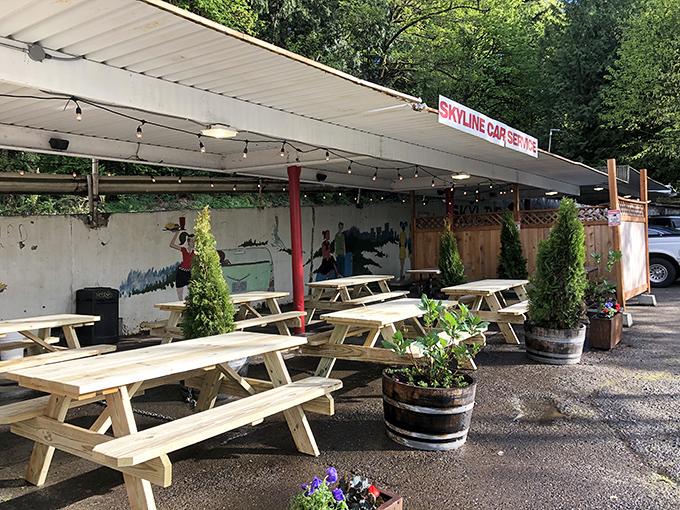 Outdoor seating where summer memories are made, one burger at a time. Those picnic tables have heard more satisfied sighs than a spa.