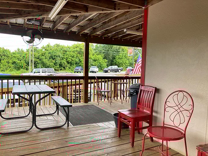The covered porch where sweet tea tastes sweeter, conversations flow easier, and nobody's in a hurry to leave – Southern hospitality in architectural form.