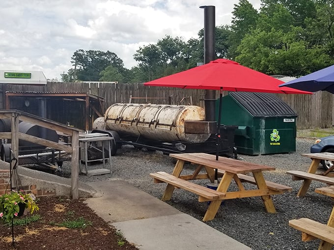 Where the magic happens—the serious smoker setup out back tells you these folks aren't playing around when it comes to low-and-slow perfection.