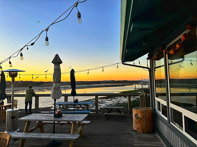 The outdoor deck at sunset—where the golden hour transforms a simple meal into a California moment worth remembering long after the last bite.