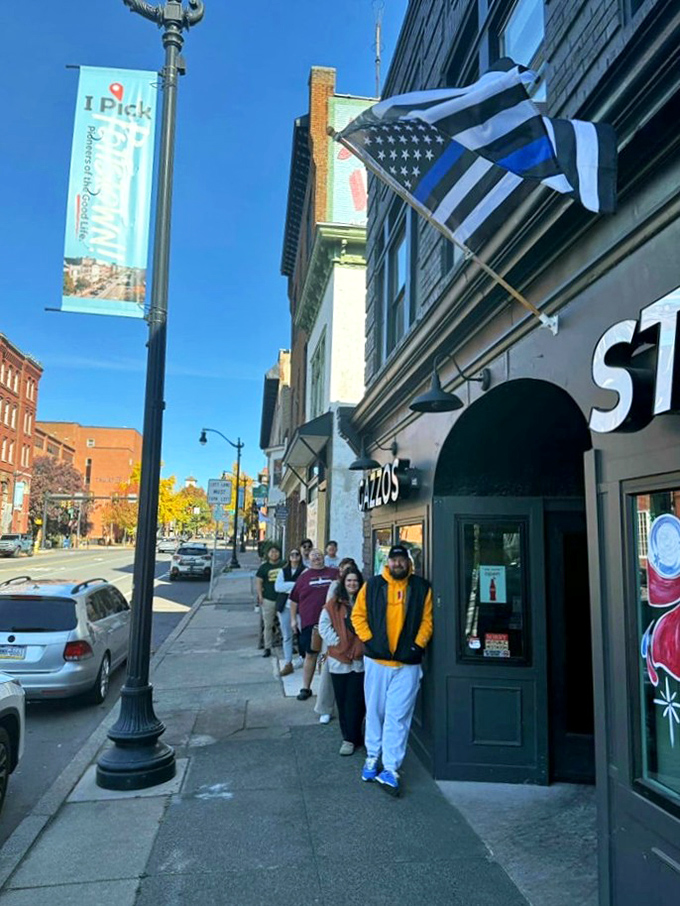 The line forms here for good reason – some things are worth the wait, especially when cheese is involved.