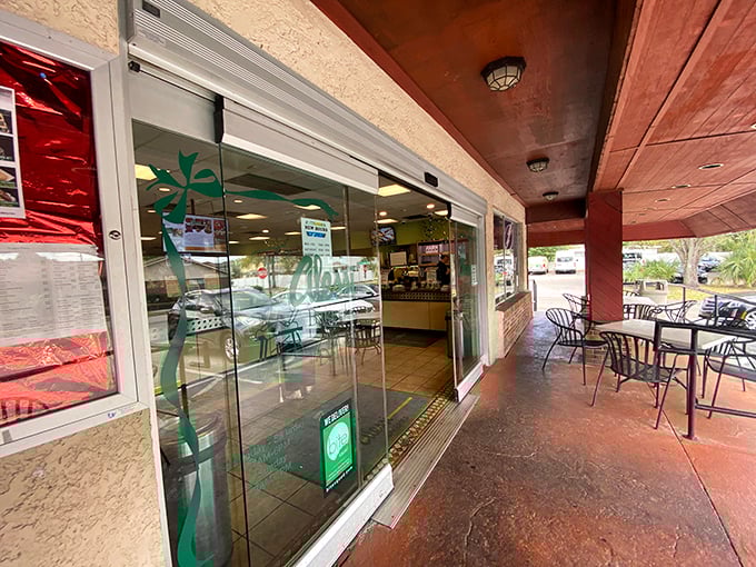 The outdoor seating area—where pastry-laden conversations happen and Tampa's weather actually works in your favor.