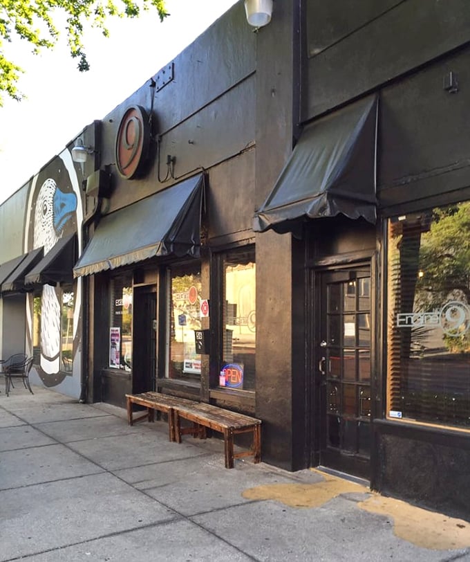 Simple wooden benches outside invite you to pause before entering—or provide a spot to contemplate the flavor journey you've just experienced.